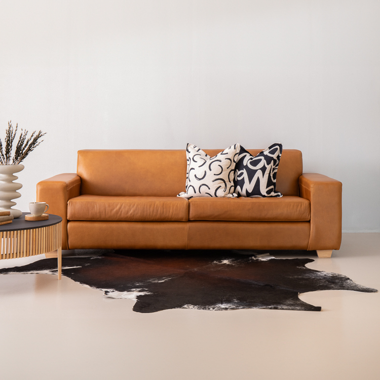 R5,200 off on Karoo Bovine Naku Ginger Couch | OneDayOnly