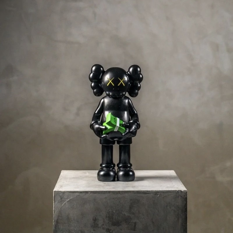 38% off on 35cm Kaws Money Sculpture | OneDayOnly