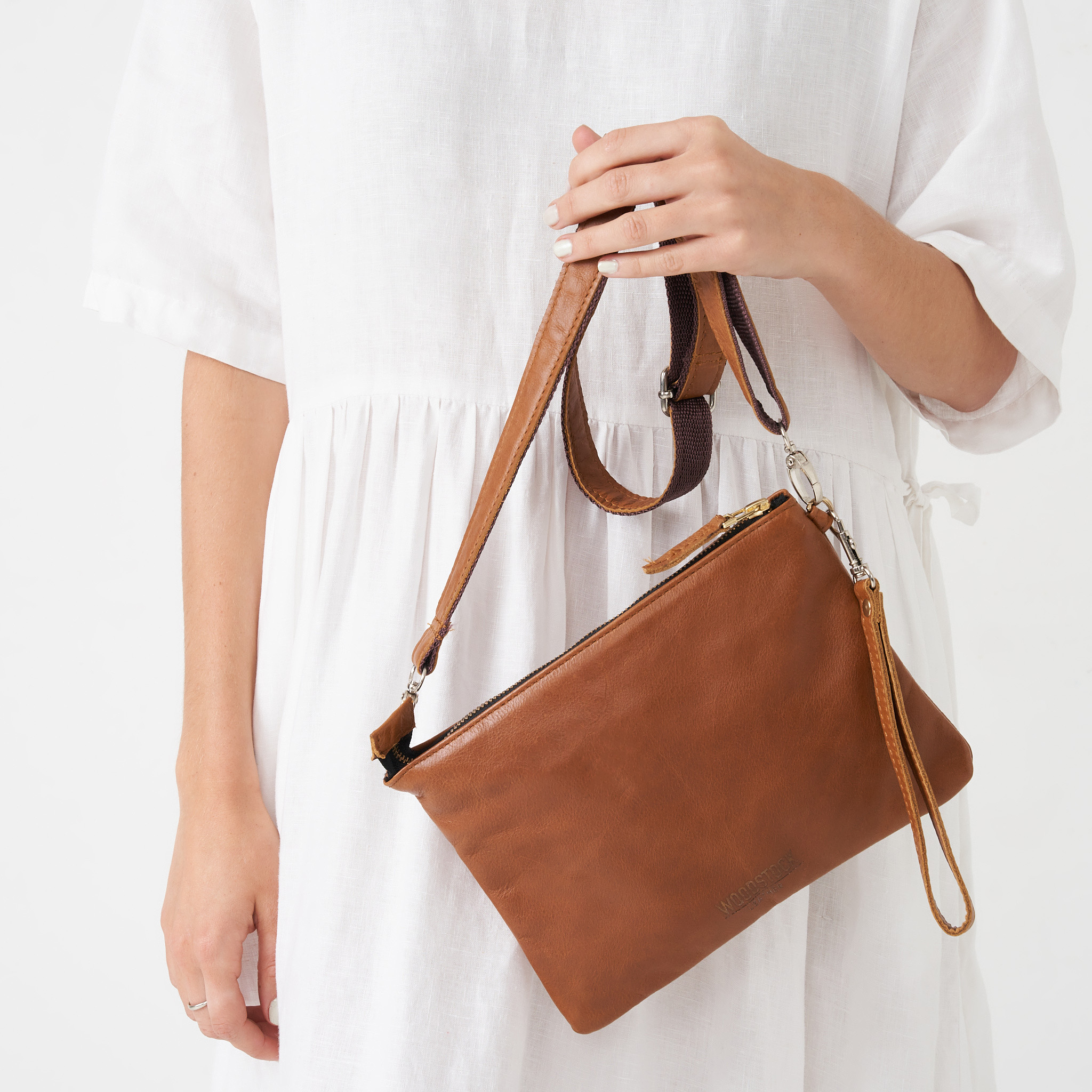 38% off on Genuine Leather Terry Wrist Clutch | OneDayOnly